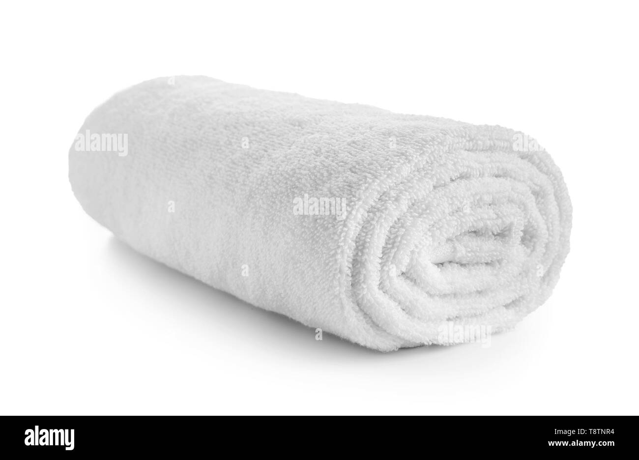 Rolled clean soft towel on white background Stock Photo - Alamy