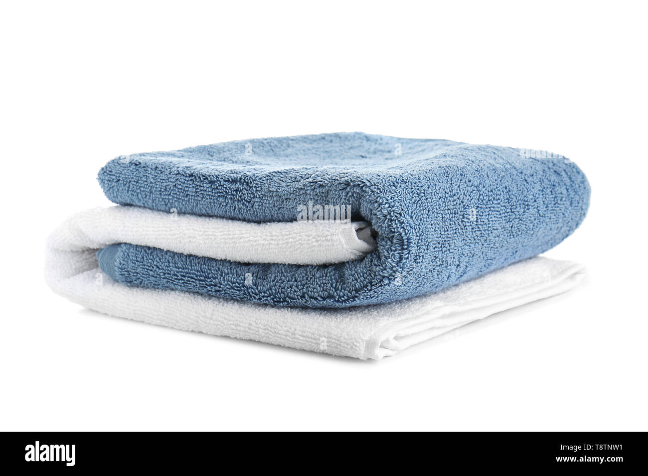 Stack of clean soft towels on white background Stock Photo - Alamy