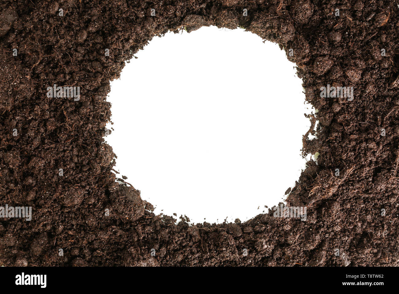 Round frame made of soil on white background Stock Photo - Alamy