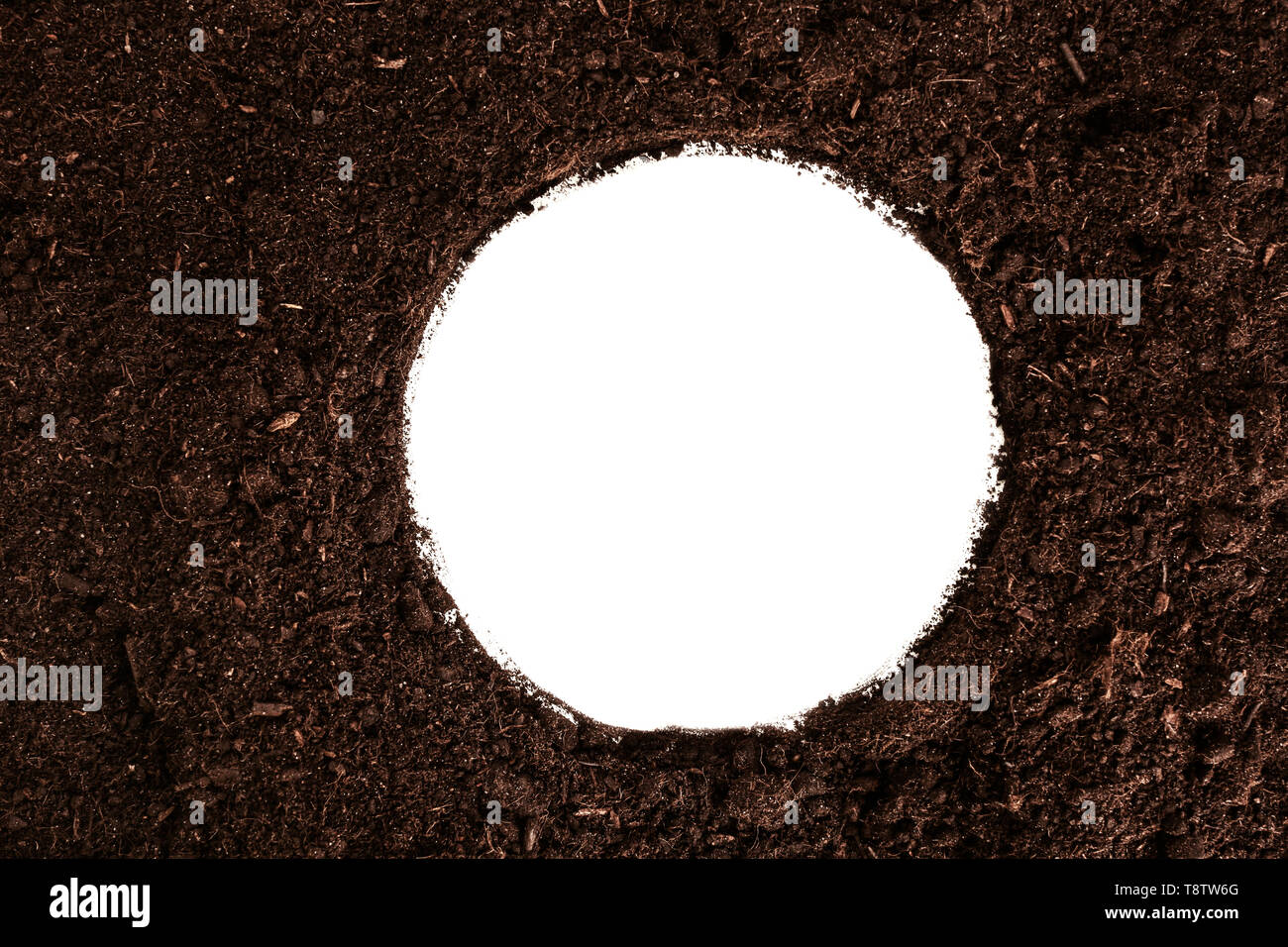 Round frame made of soil on white background Stock Photo - Alamy