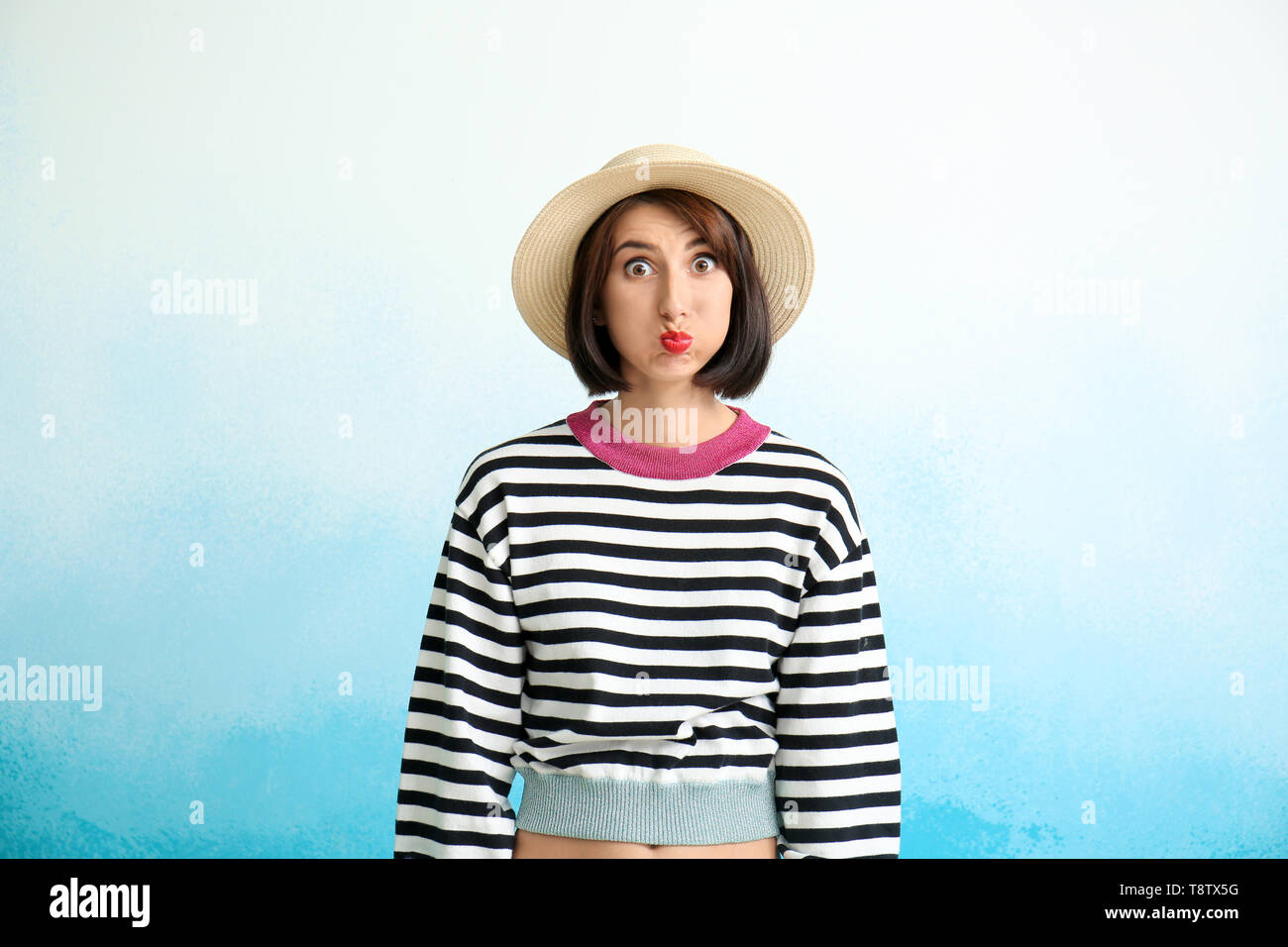 Portrait of beautiful funny woman on color background Stock Photo - Alamy