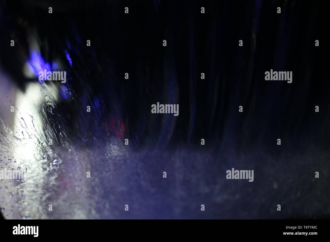 Rain through a window at night Stock Photo - Alamy