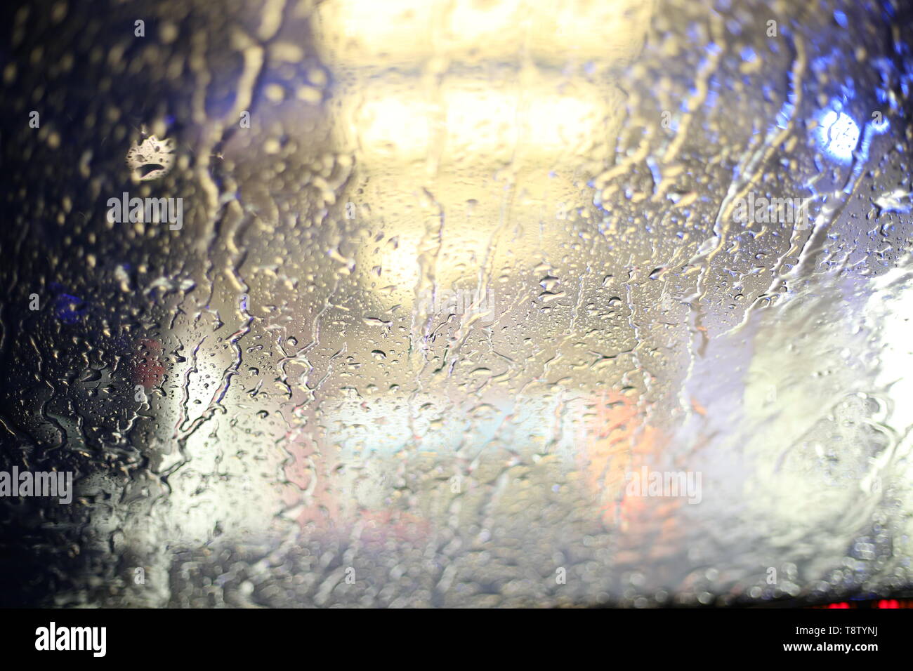 Rain through a window at night Stock Photo - Alamy