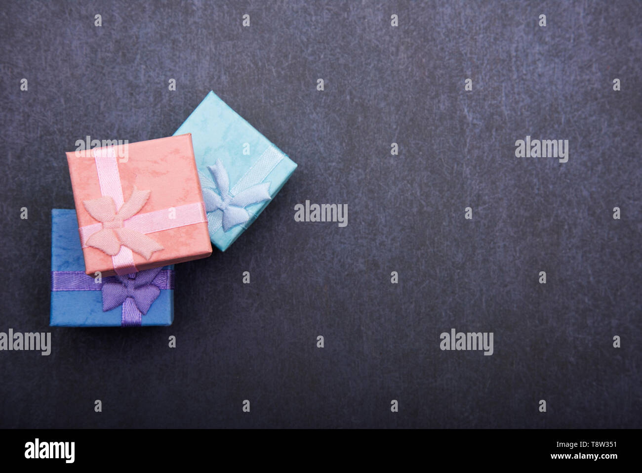 Wrapped grey gift boxes hi-res stock photography and images - Alamy