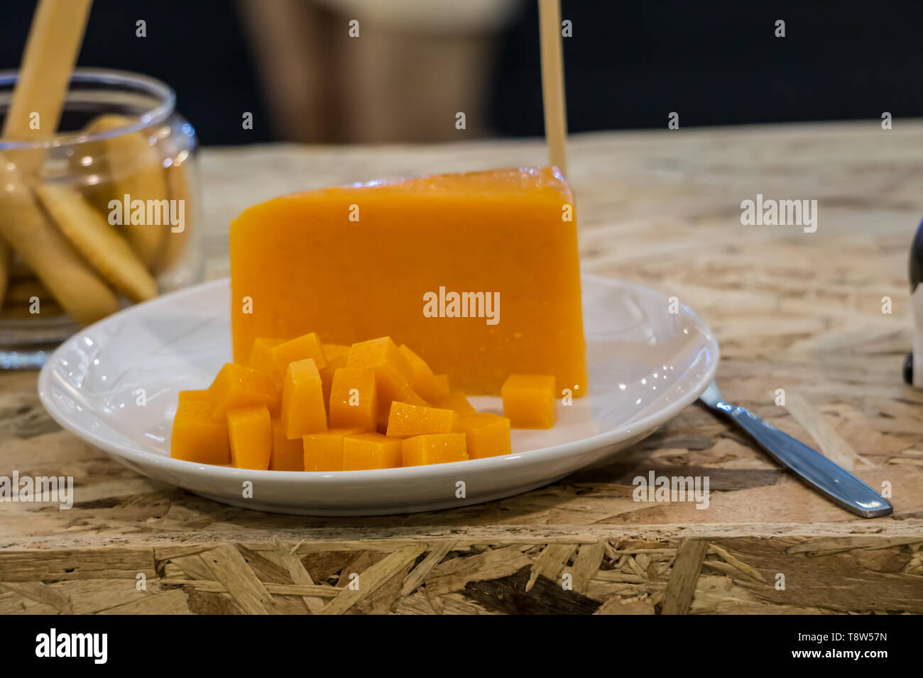 Cheddar Cheese Ingredient in Plate Stock Photo - Alamy