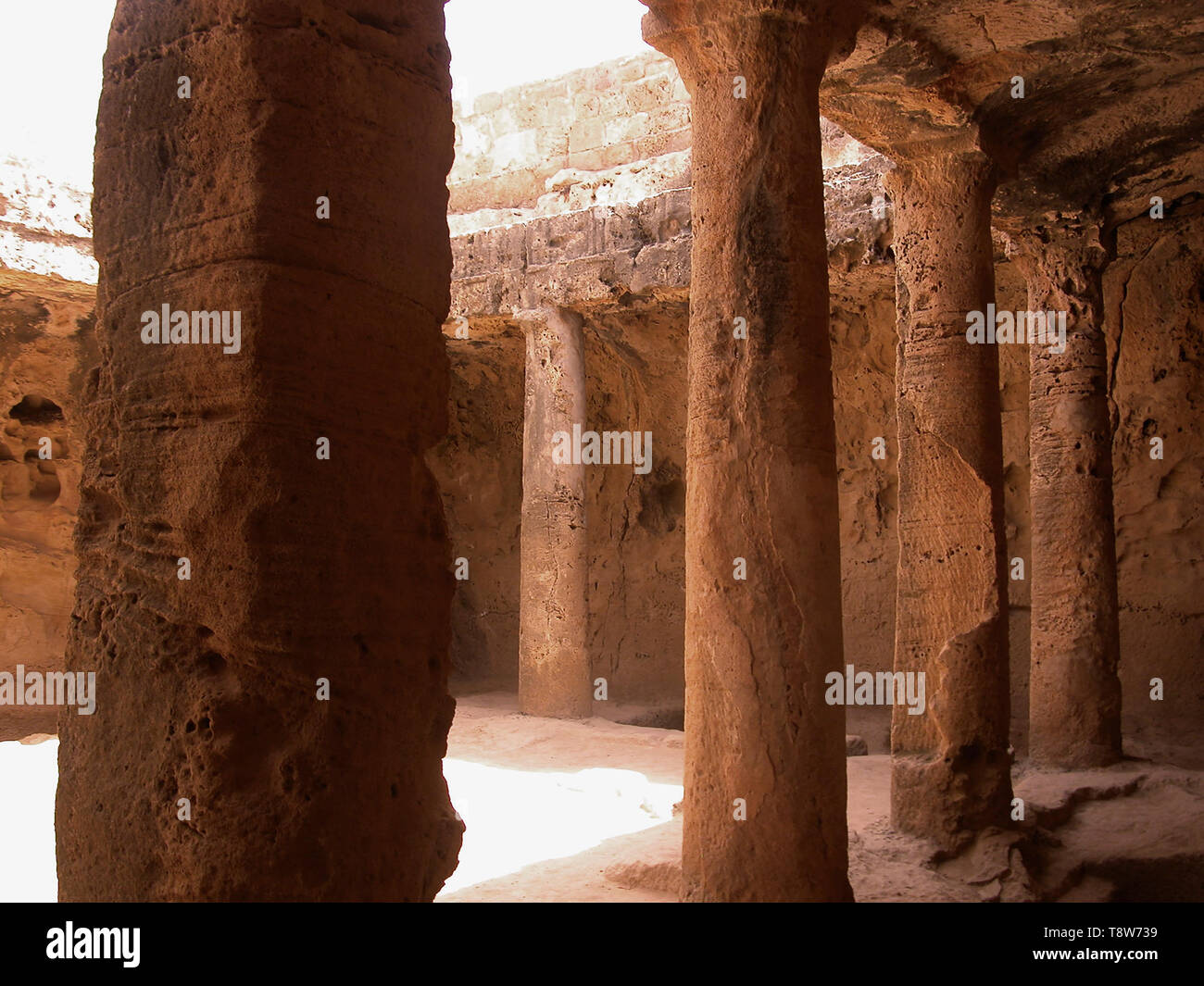 inside the sunken courtyard of a burial chamber, Tombs of the Kings ...