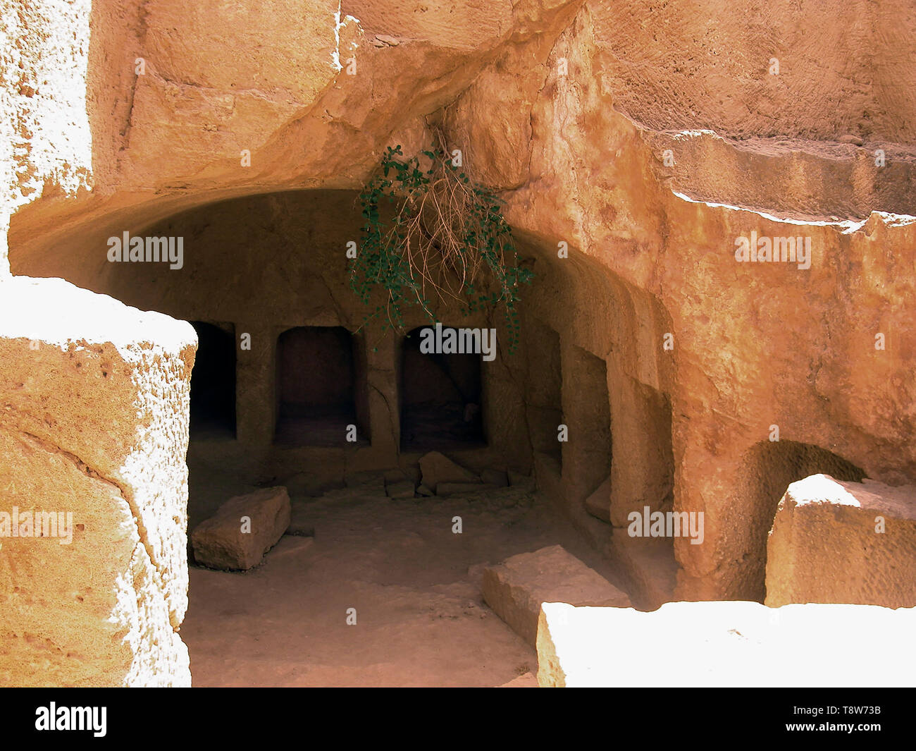 inside the sunken courtyard of a burial chamber, Tombs of the Kings ...