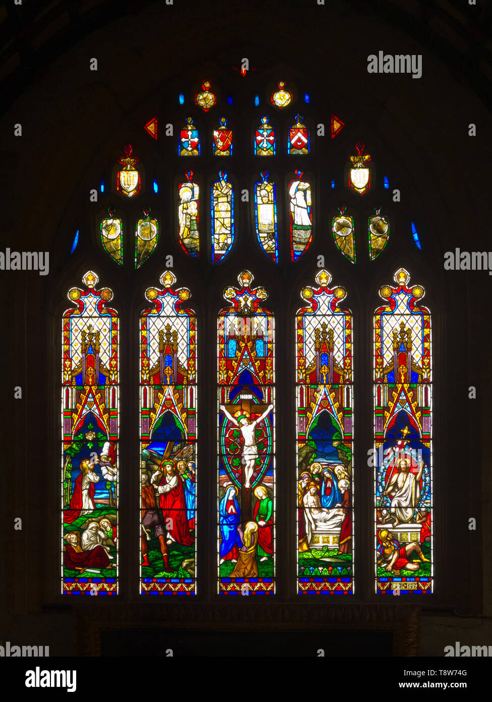 the stain glass windows above the altar at the east end of the Church ...