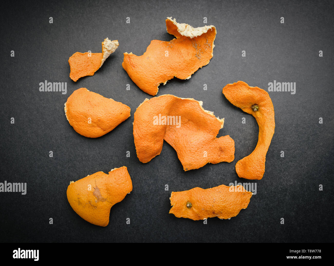 Dried mandarin peel on dark background Stock Photo - Alamy