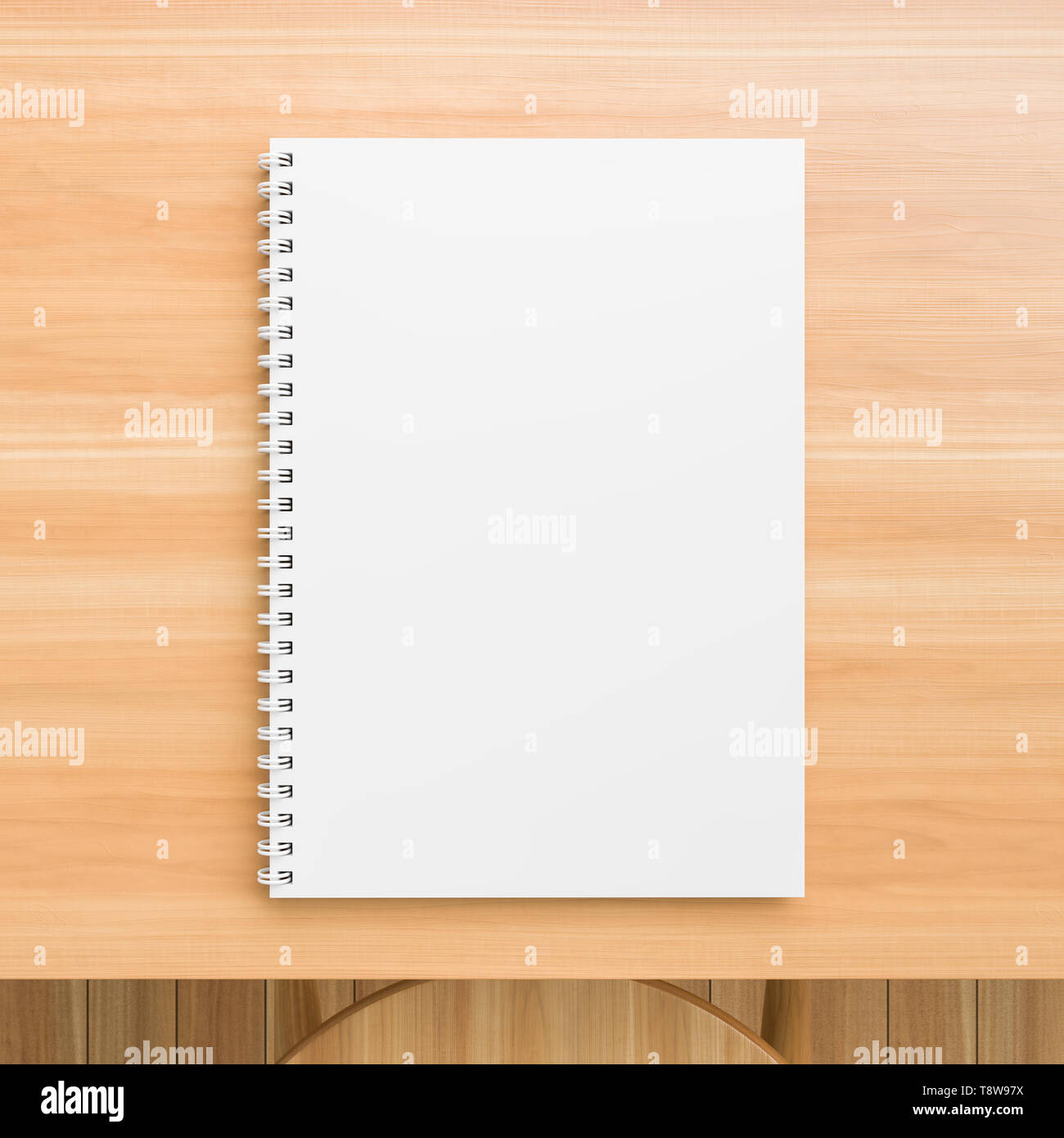 A4 format spiral binding notebook mock up on wooden table. Realistic ...
