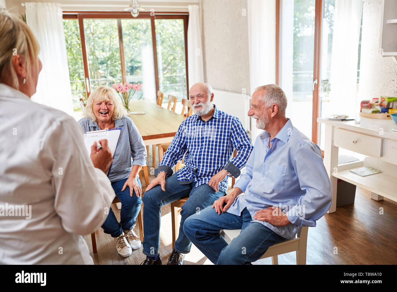 Group therapy meeting old hi-res stock photography and images - Alamy
