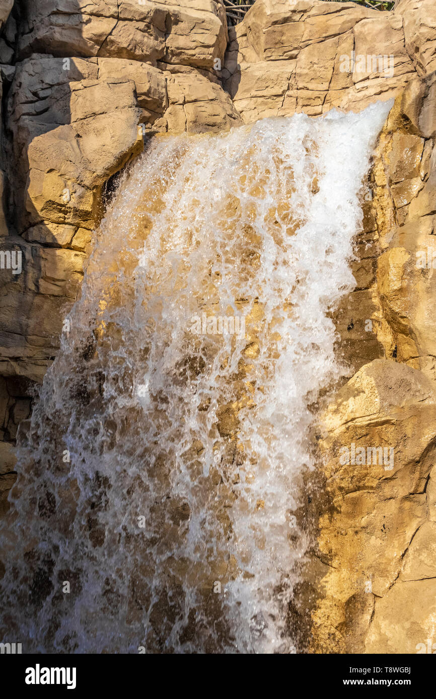 Decorative large waterfall for tourists in the city Stock Photo - Alamy