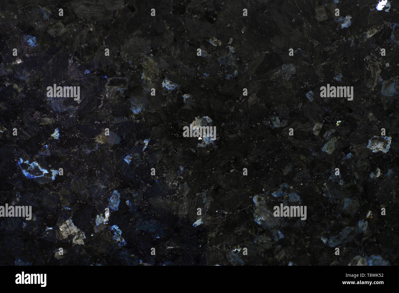 Natural stone black granite with shiny blue mica splashes, labradorite ...