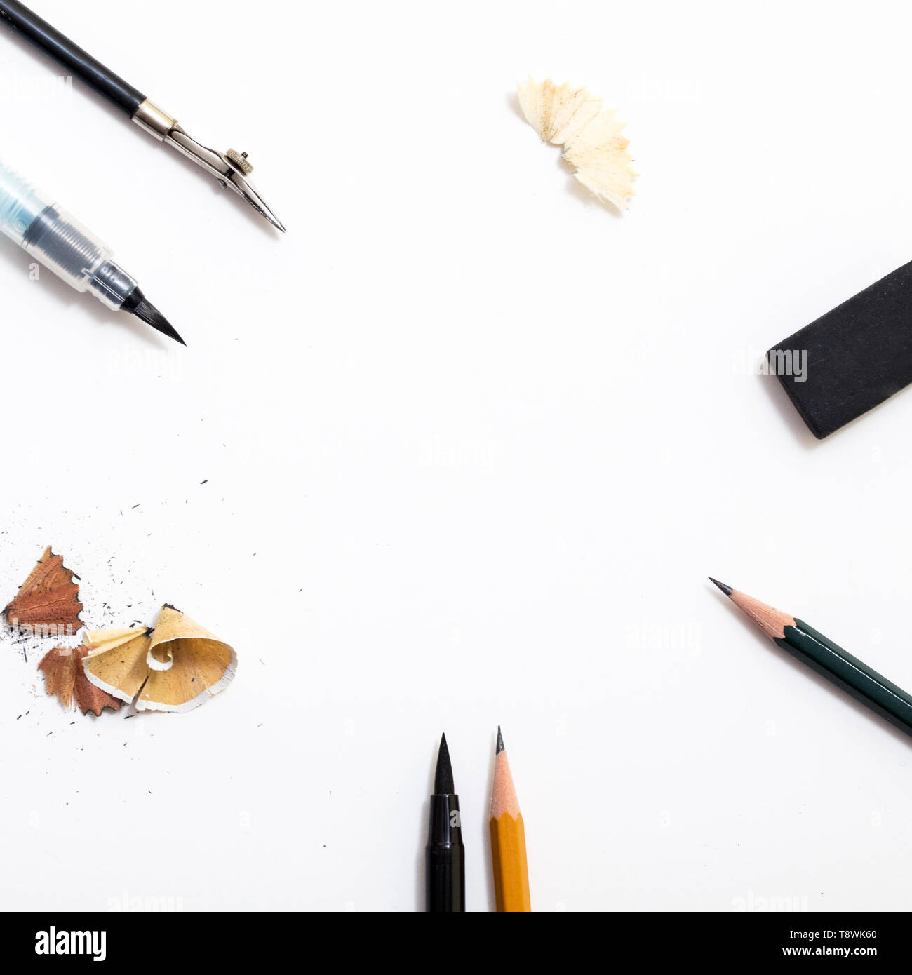 Background with white paper, pencils and eraser. Workplace for the ...