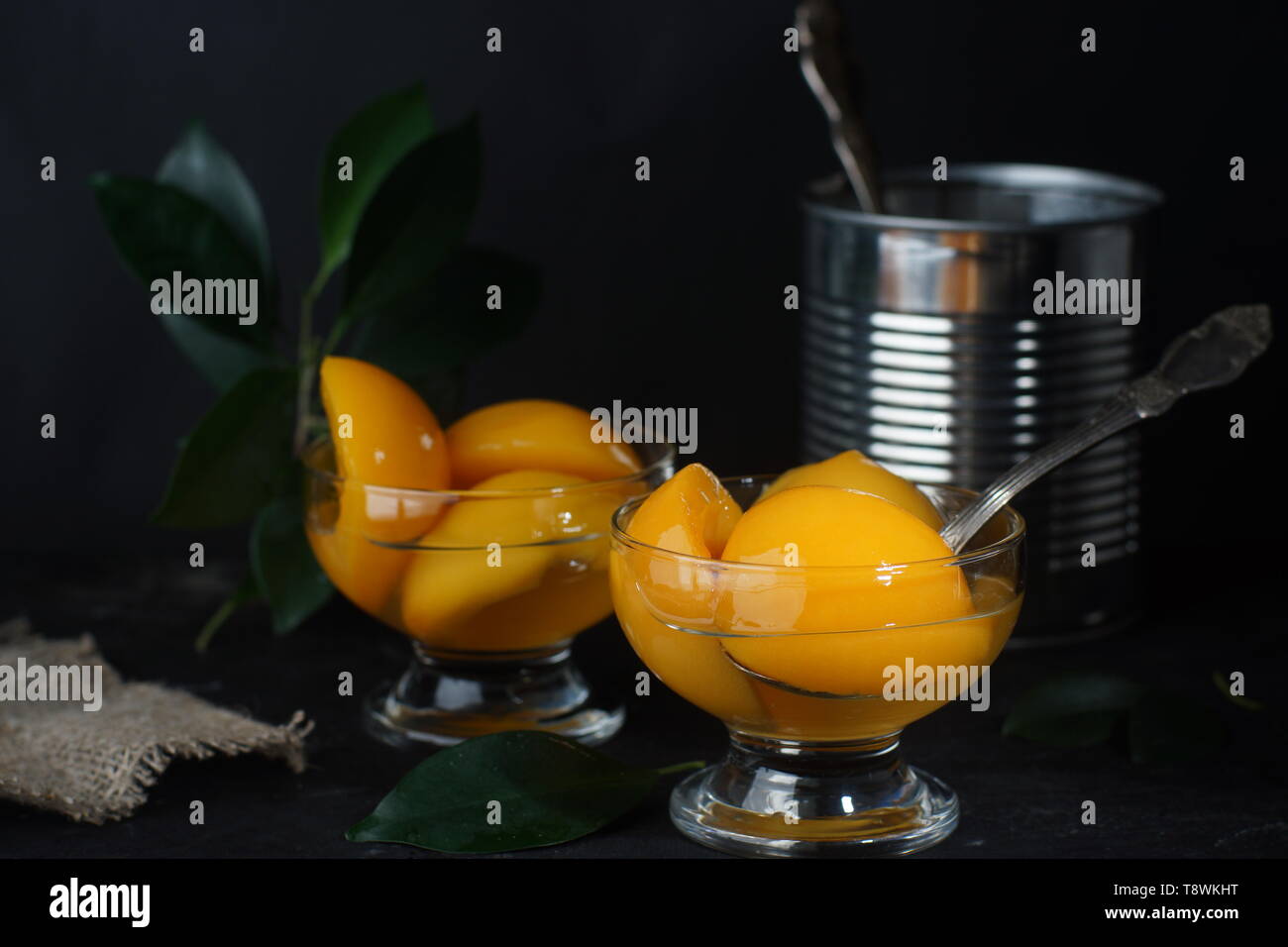 Canned peaches in syrup hi-res stock photography and images - Alamy
