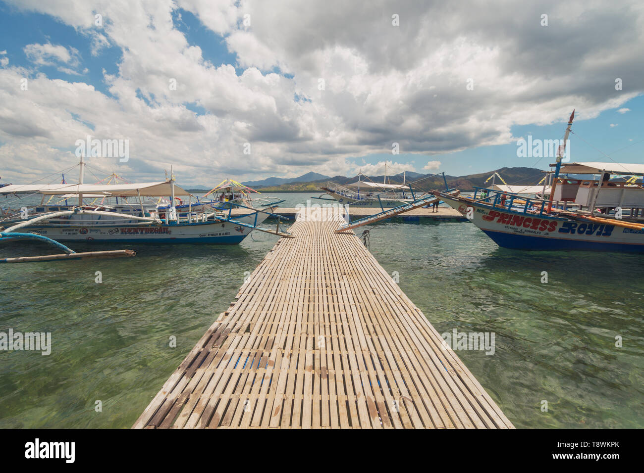 A boat wooden pier in Luli island, Honda Bay, Philippines Stock Photo ...