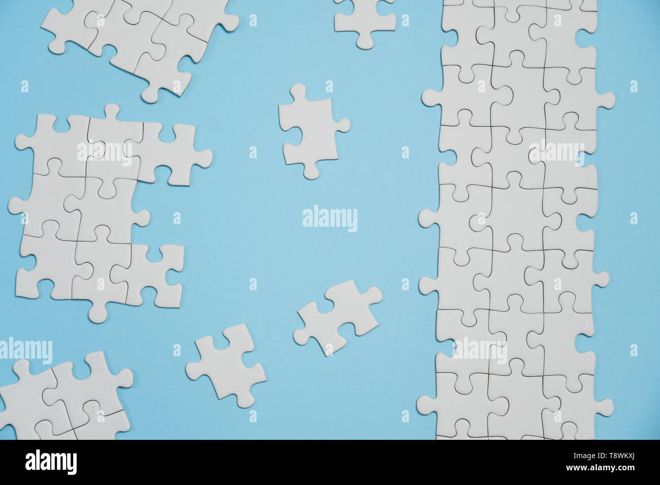 Missing jigsaw puzzle pieces. Business concept. Fragment of a folded ...