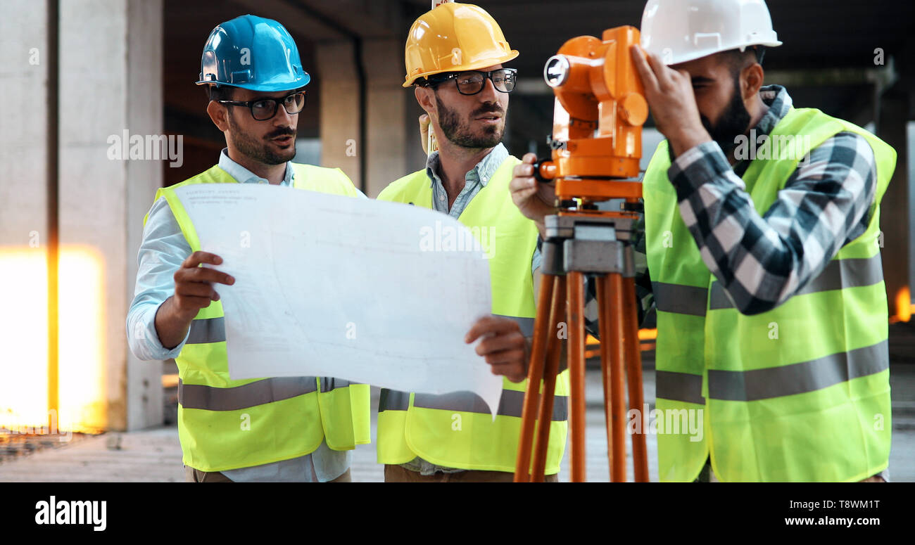 Group of engineering team had meeting at working site Stock Photo - Alamy