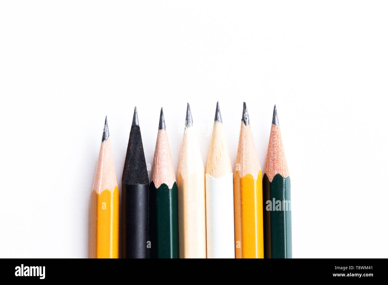 Background with white paper and pencils. Workplace for the artist and ...