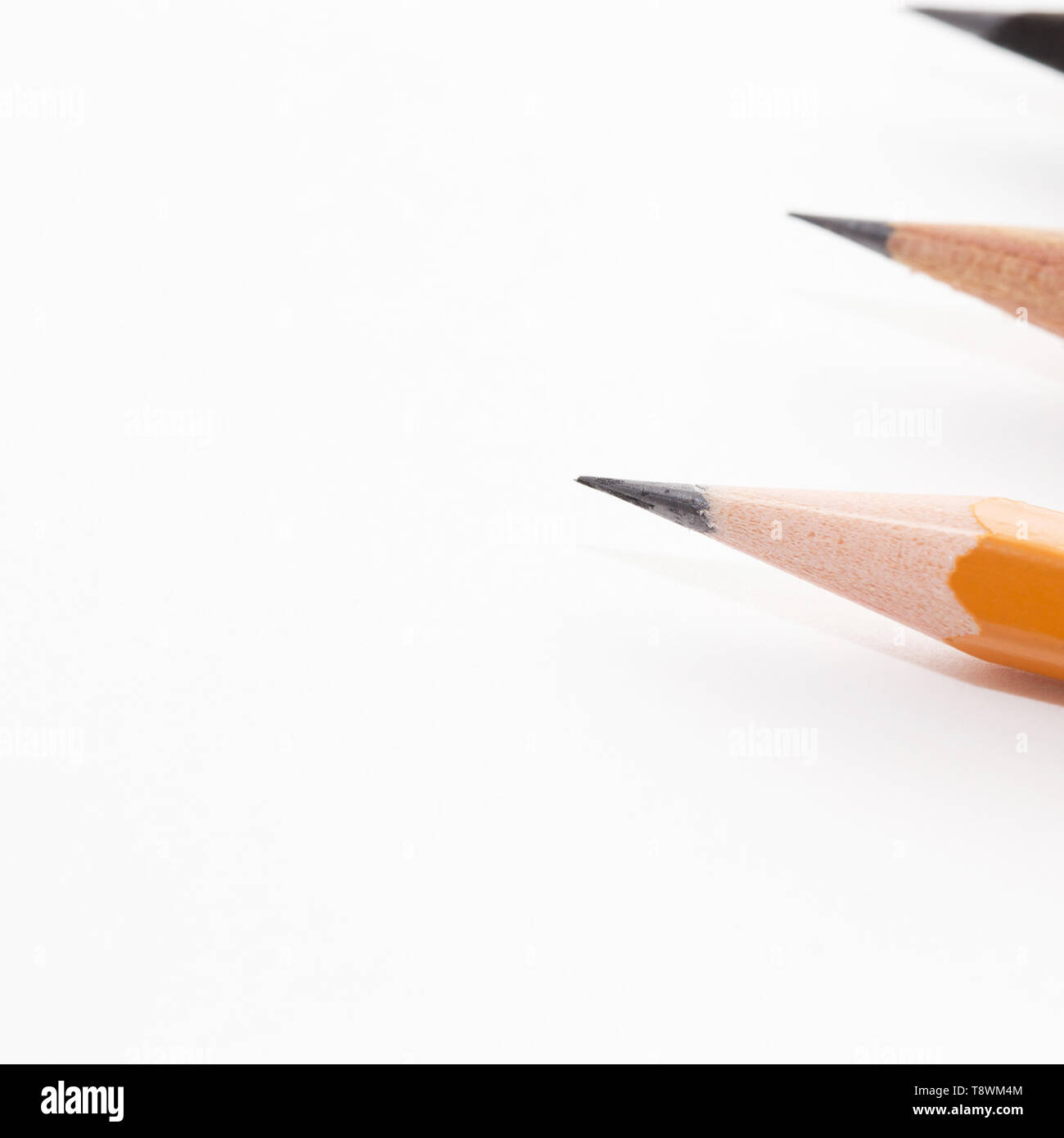 Background with white paper and pencils. Workplace for the artist and ...