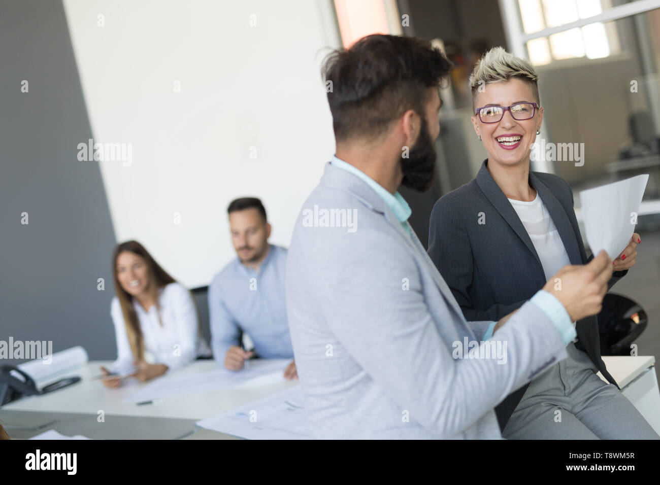 Talk consulting colleagues office hi-res stock photography and images ...