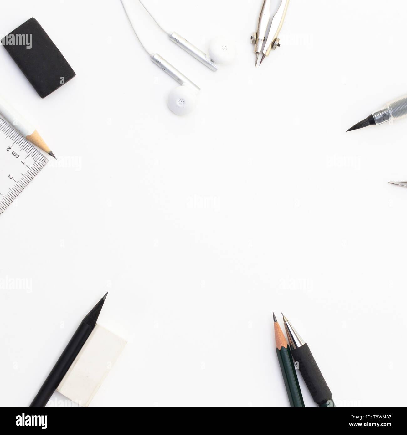 Background with white paper, pencils and eraser. Workplace for the ...