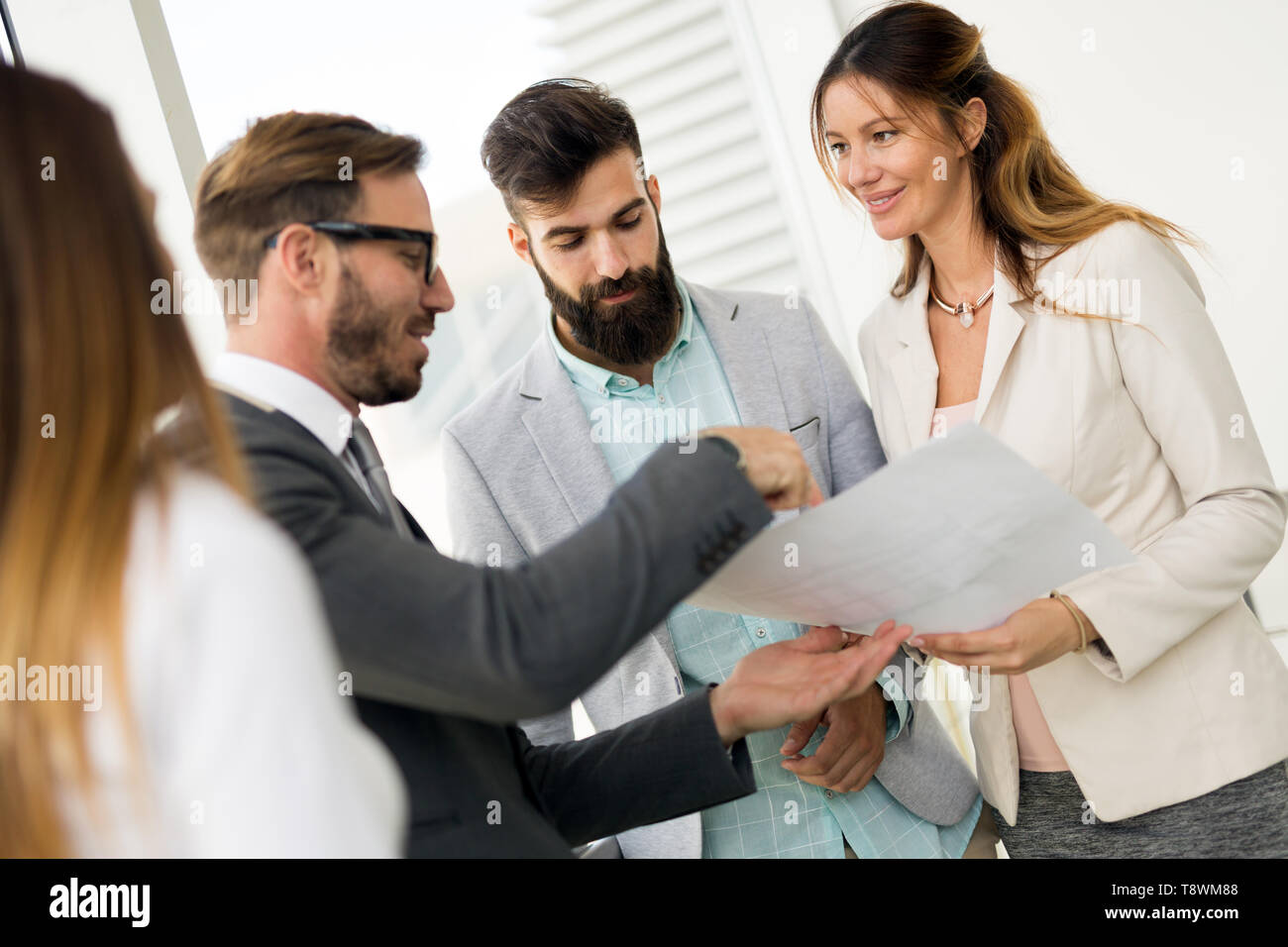 Professional business team discussing strategy hi-res stock photography ...