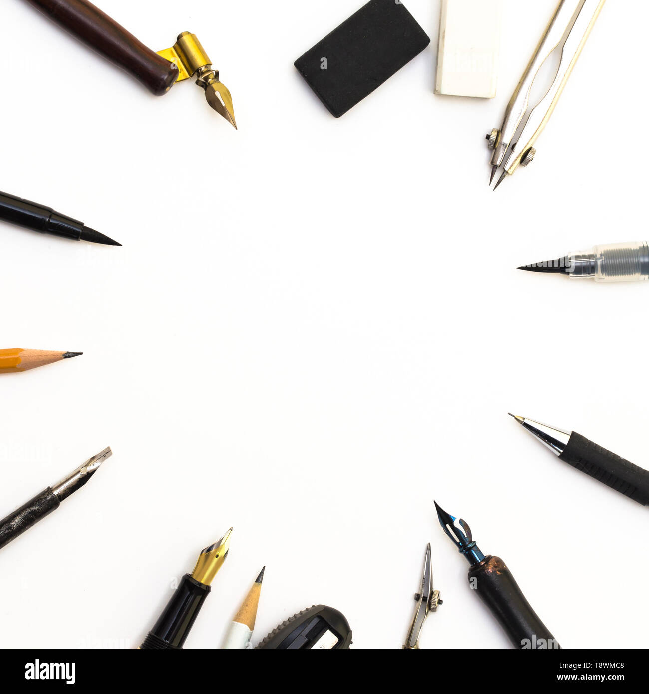 Background with white paper, pencils and eraser. Workplace for the ...