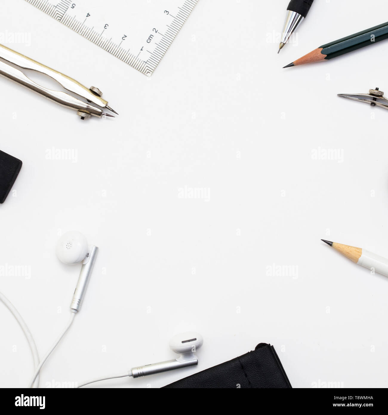 Background with white paper, pencils and eraser. Workplace for the ...