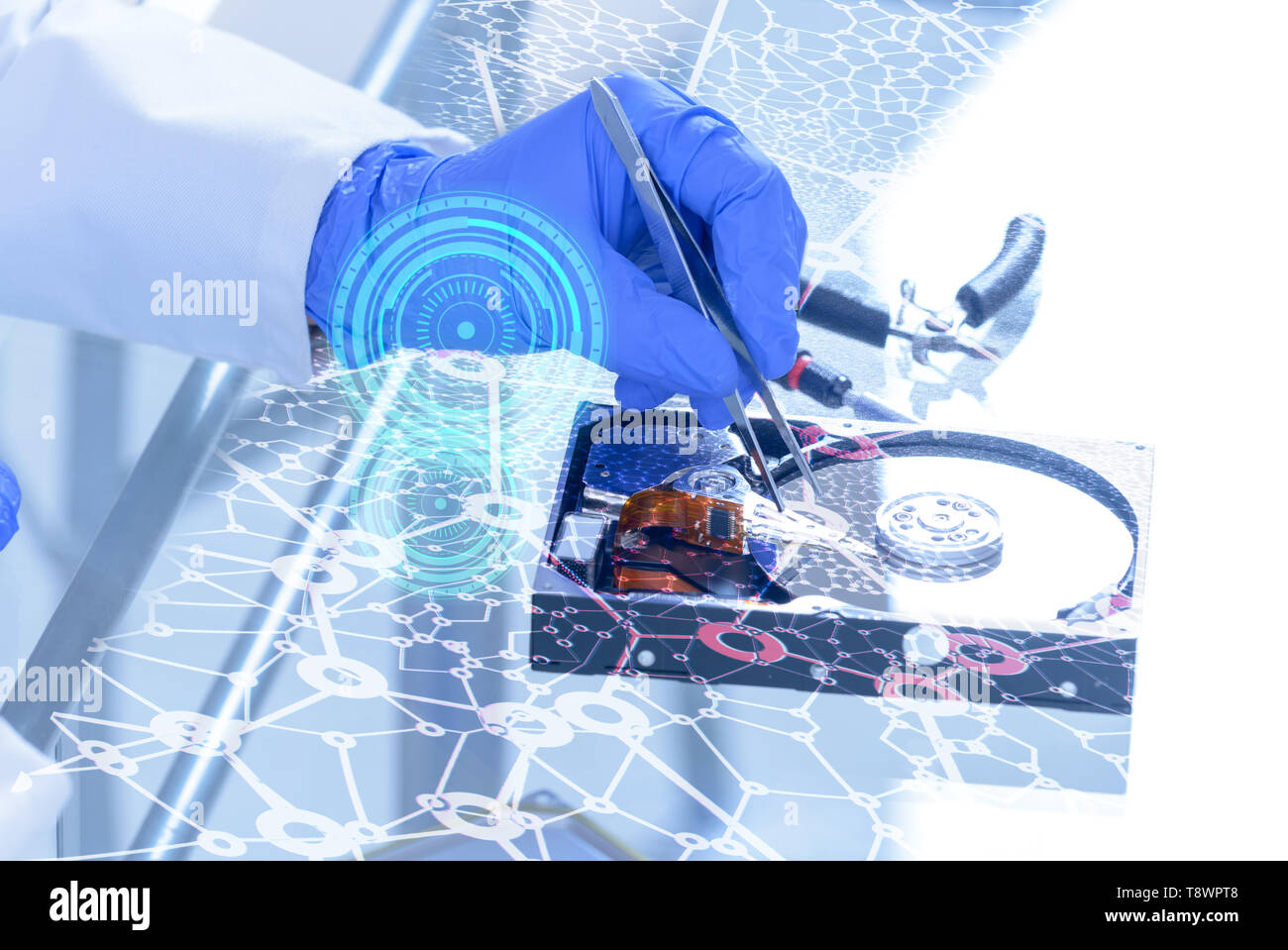 Service man fixing disk failure, hands protected with gloves Stock ...