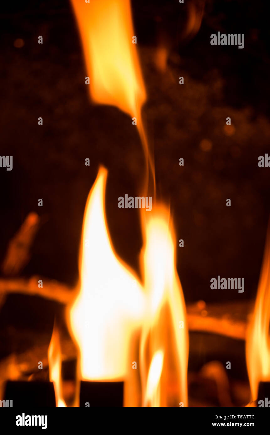 natural light burning log fire flames close up Stock Photo - Alamy