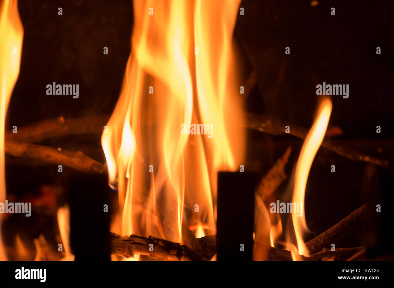 natural light burning log fire flames close up Stock Photo - Alamy