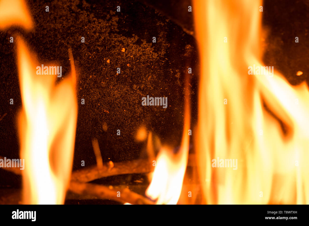 natural light burning log fire flames close up Stock Photo - Alamy