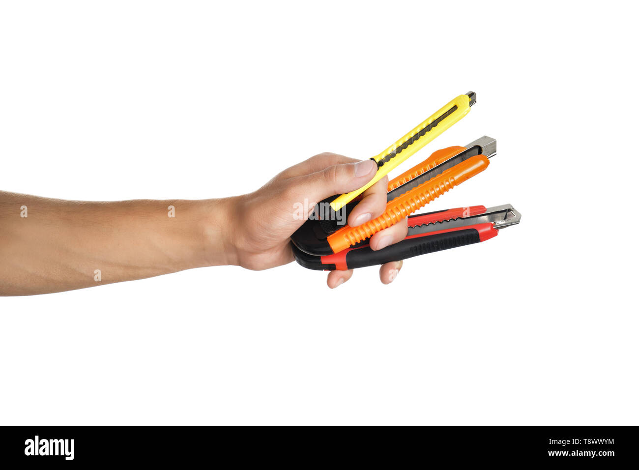 Building knives in male hand isolated on white Stock Photo - Alamy