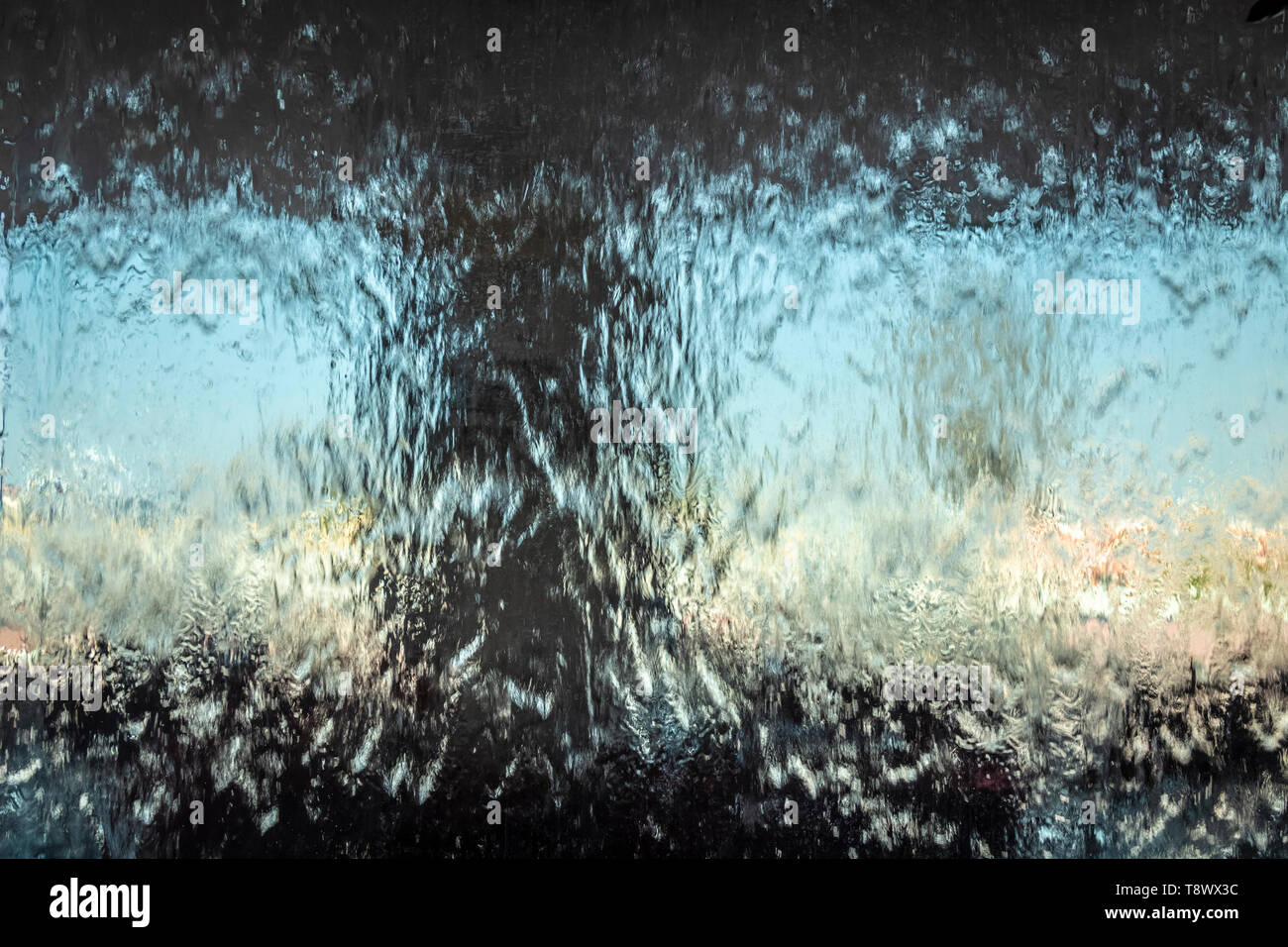 Clean water flows over the surface of the glass Stock Photo - Alamy