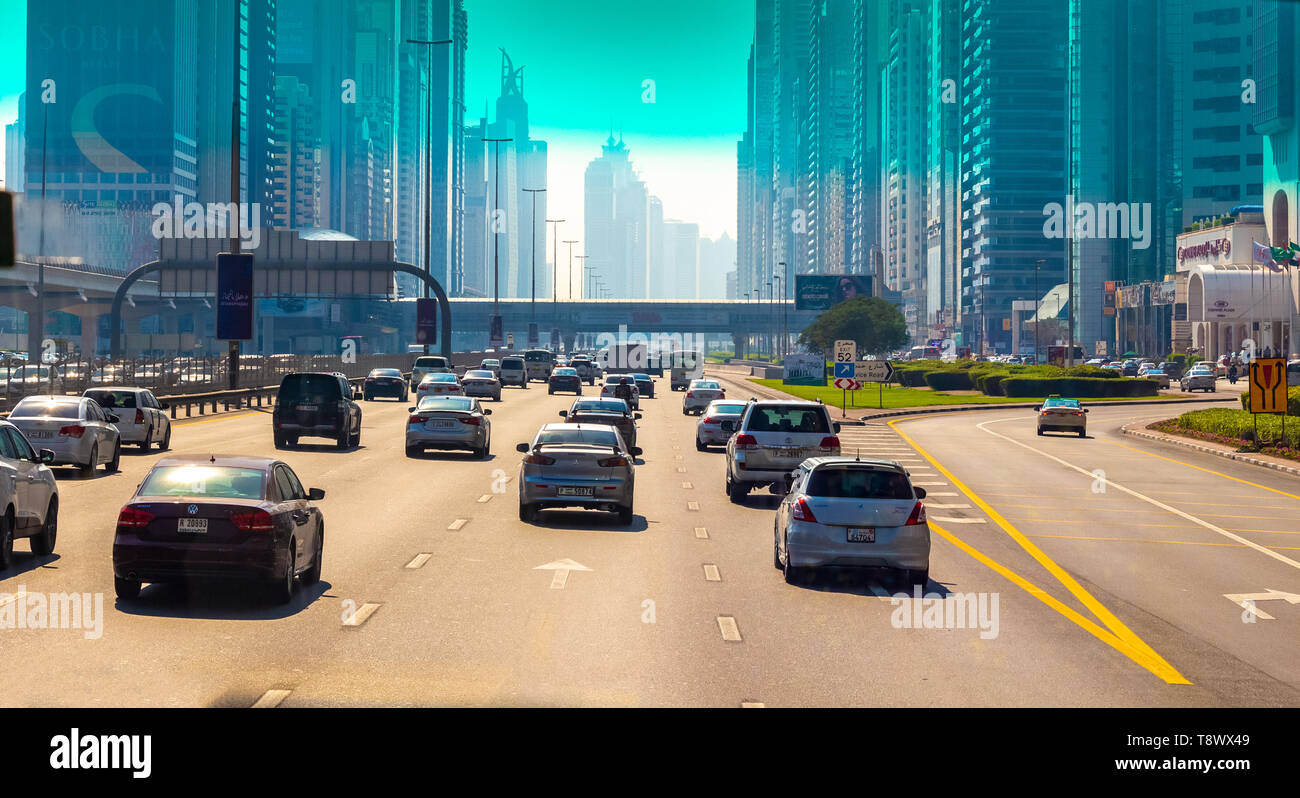 Dubai, UAE - November 29, 2018: Urban roads through the front window of ...