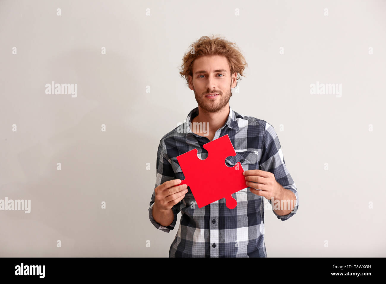 Guy on jigsaw puzzle hi-res stock photography and images - Alamy
