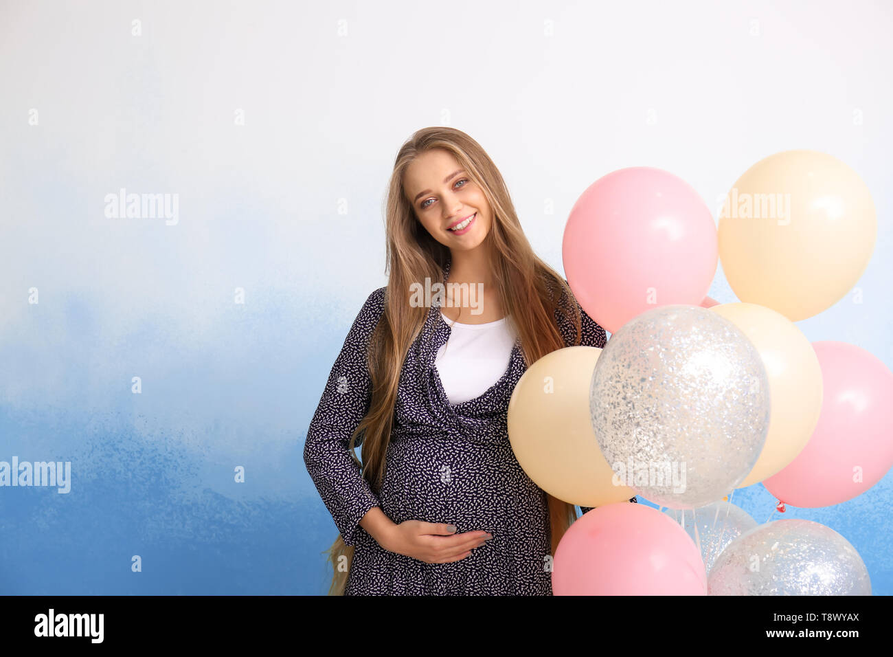 Pregnant woman balloons hi-res stock photography and images - Alamy