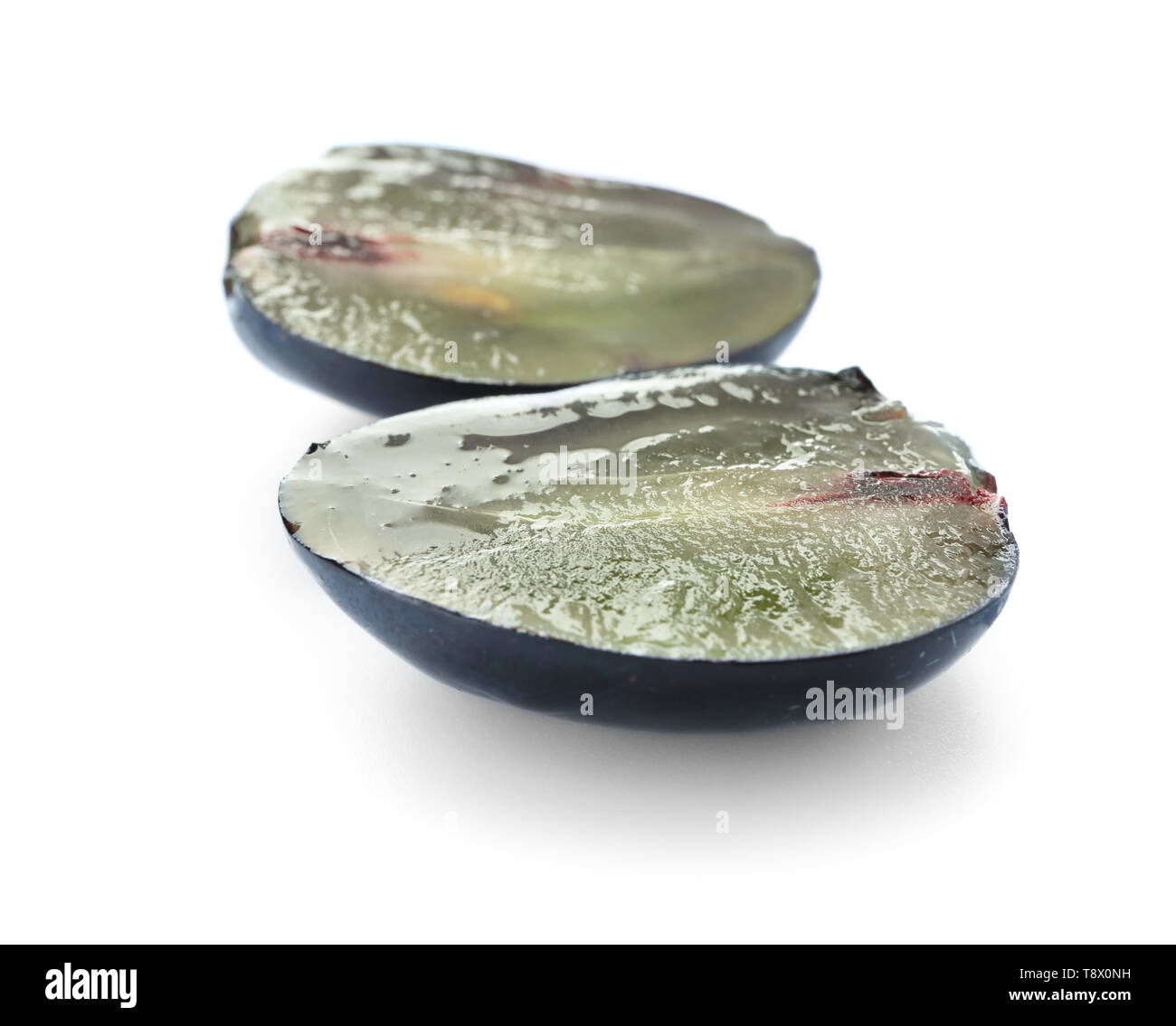 Halves dark blue grape Cut Out Stock Images & Pictures - Alamy