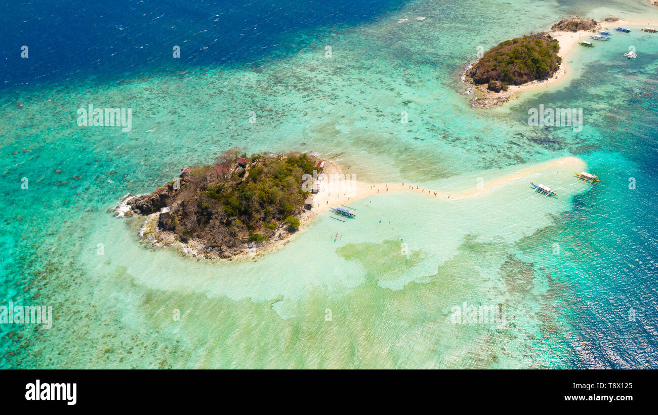 Tropical islands with white beaches. Turquoise lagoon and coral reefs ...