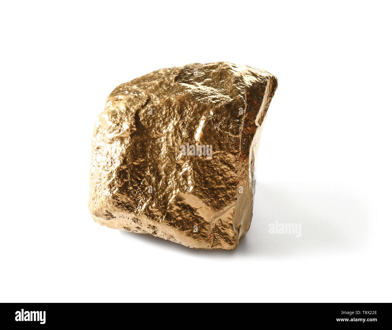 Gold nugget on white background Stock Photo - Alamy