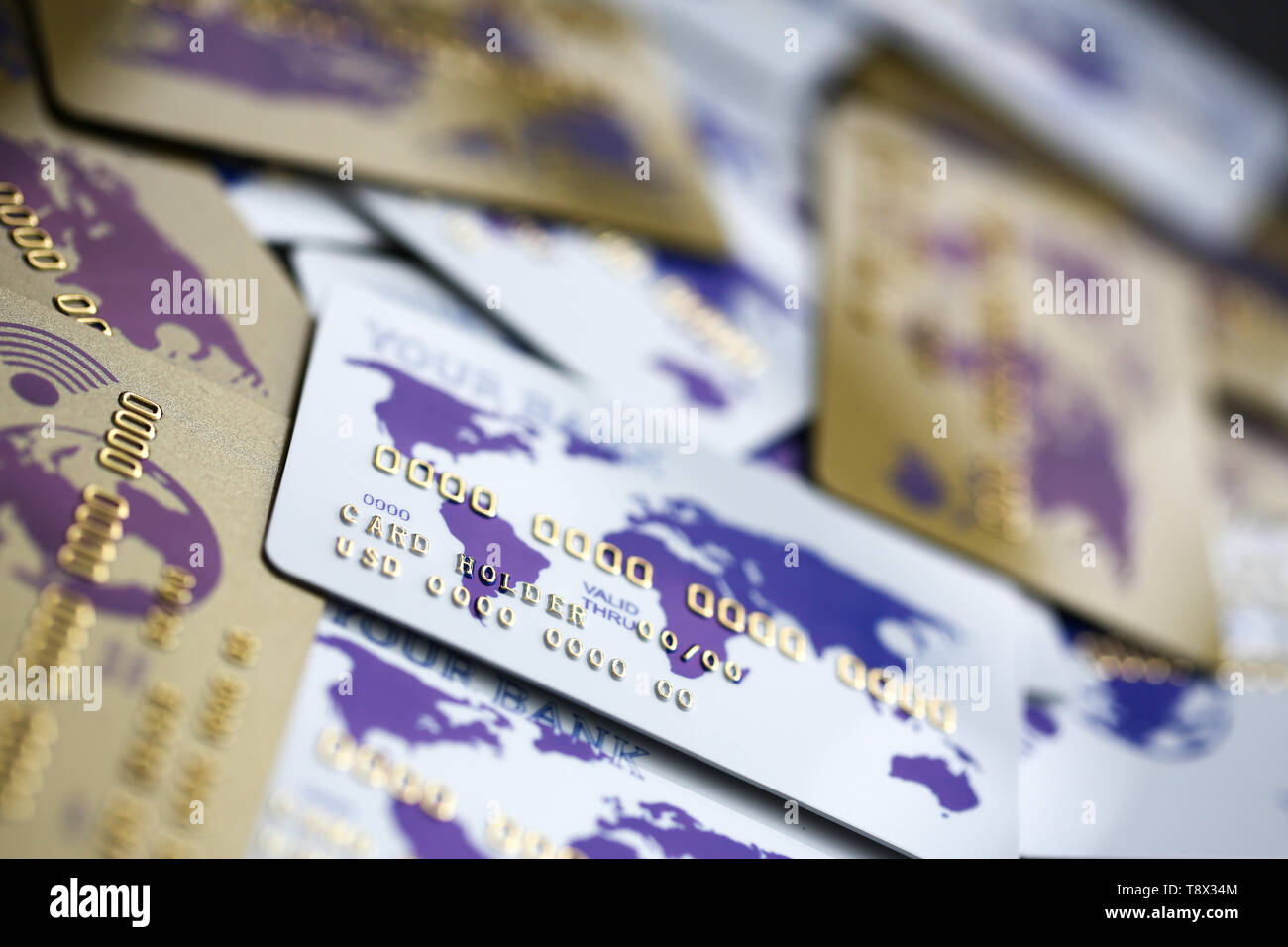 Many golden credit cards hi-res stock photography and images - Alamy