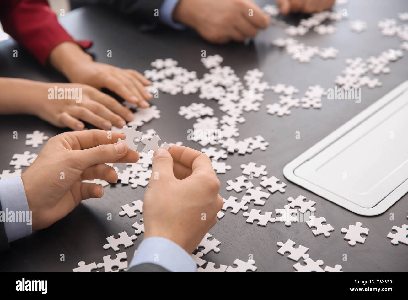 Startup business people assembling hi-res stock photography and images ...