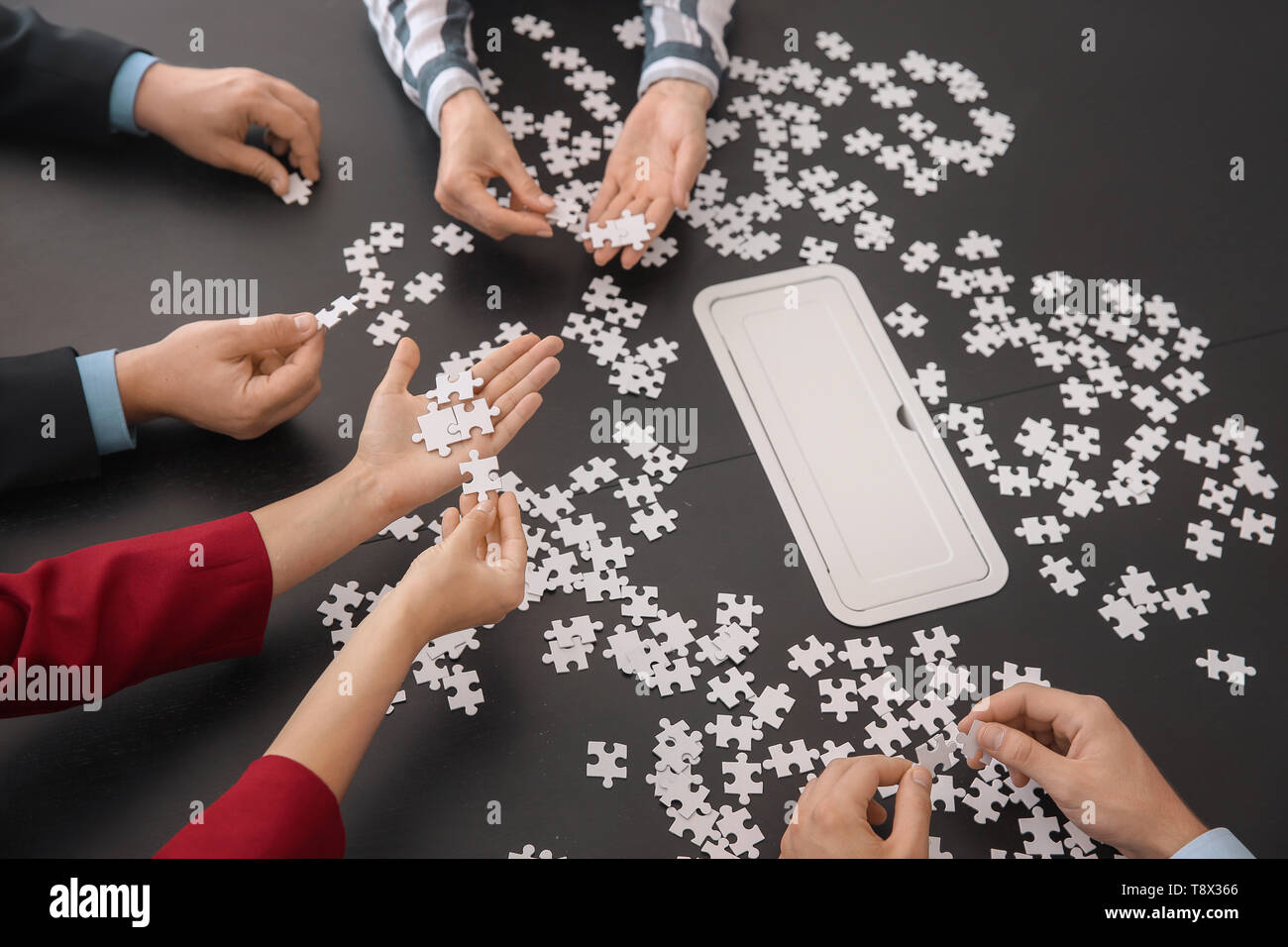 Startup business people assembling hi-res stock photography and images ...