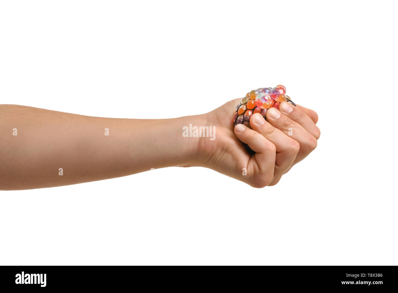 Man squeezing stress ball on white background Stock Photo - Alamy