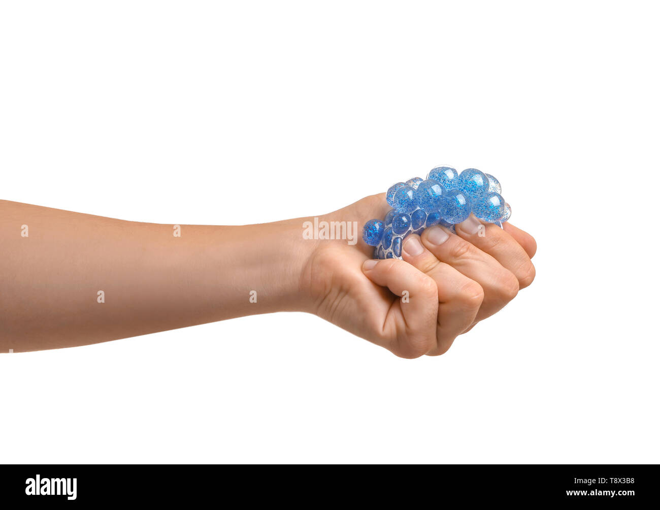 Man squeezing stress ball on white background Stock Photo - Alamy
