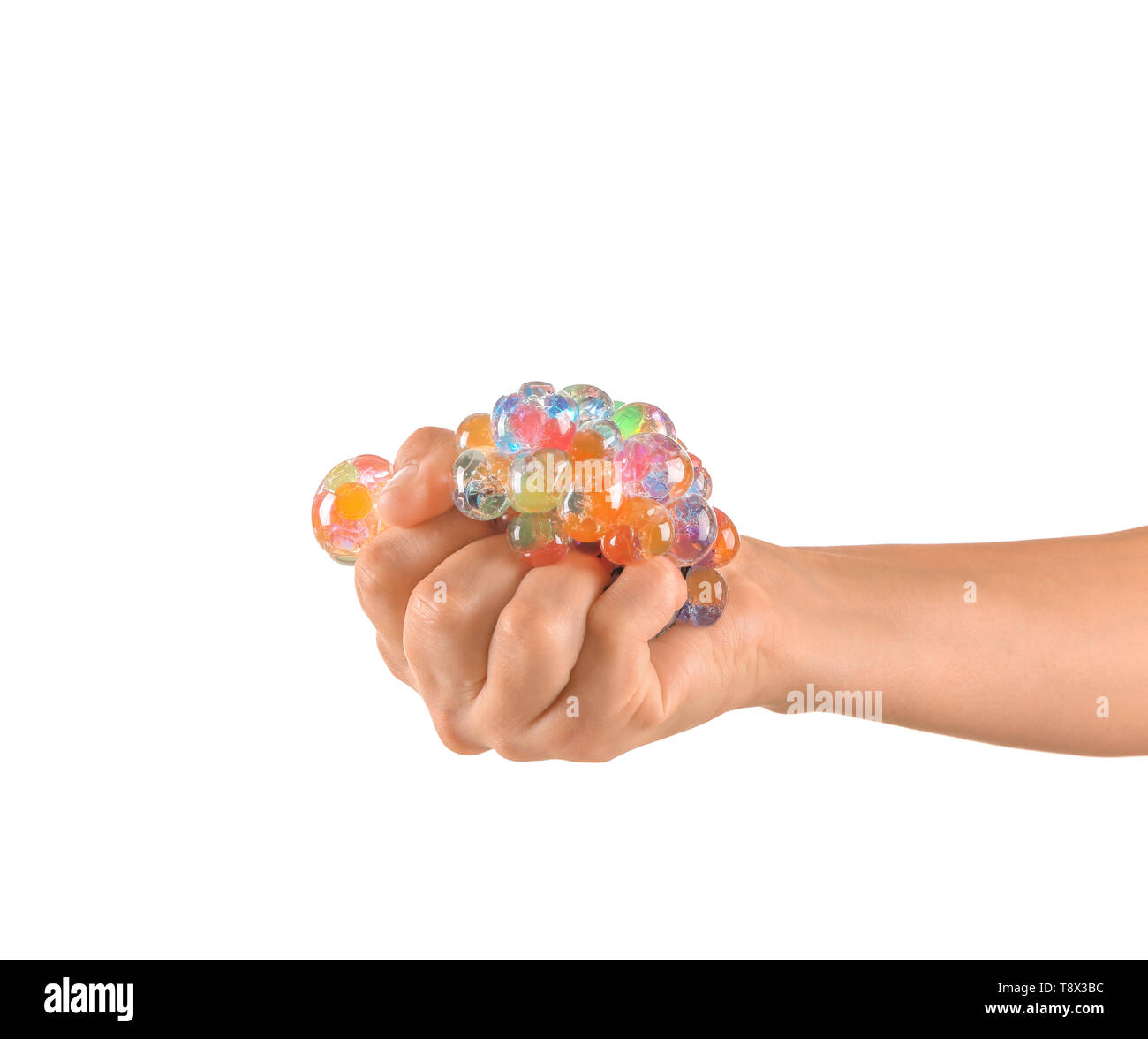 Man squeezing stress ball on white background Stock Photo - Alamy