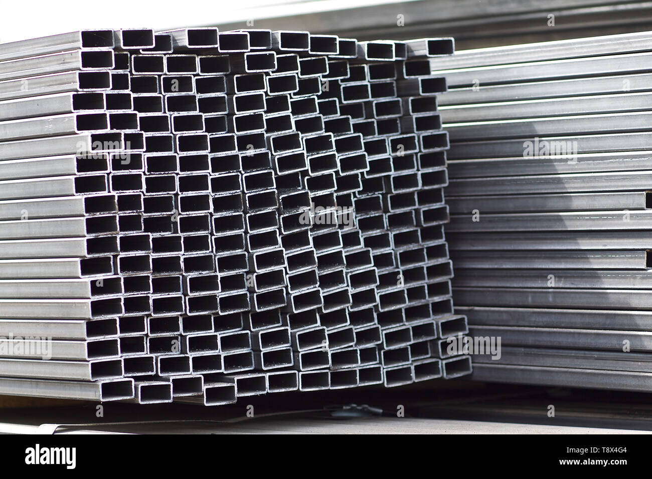 Metal profile pipe of rectangular cross section in packs at the ...