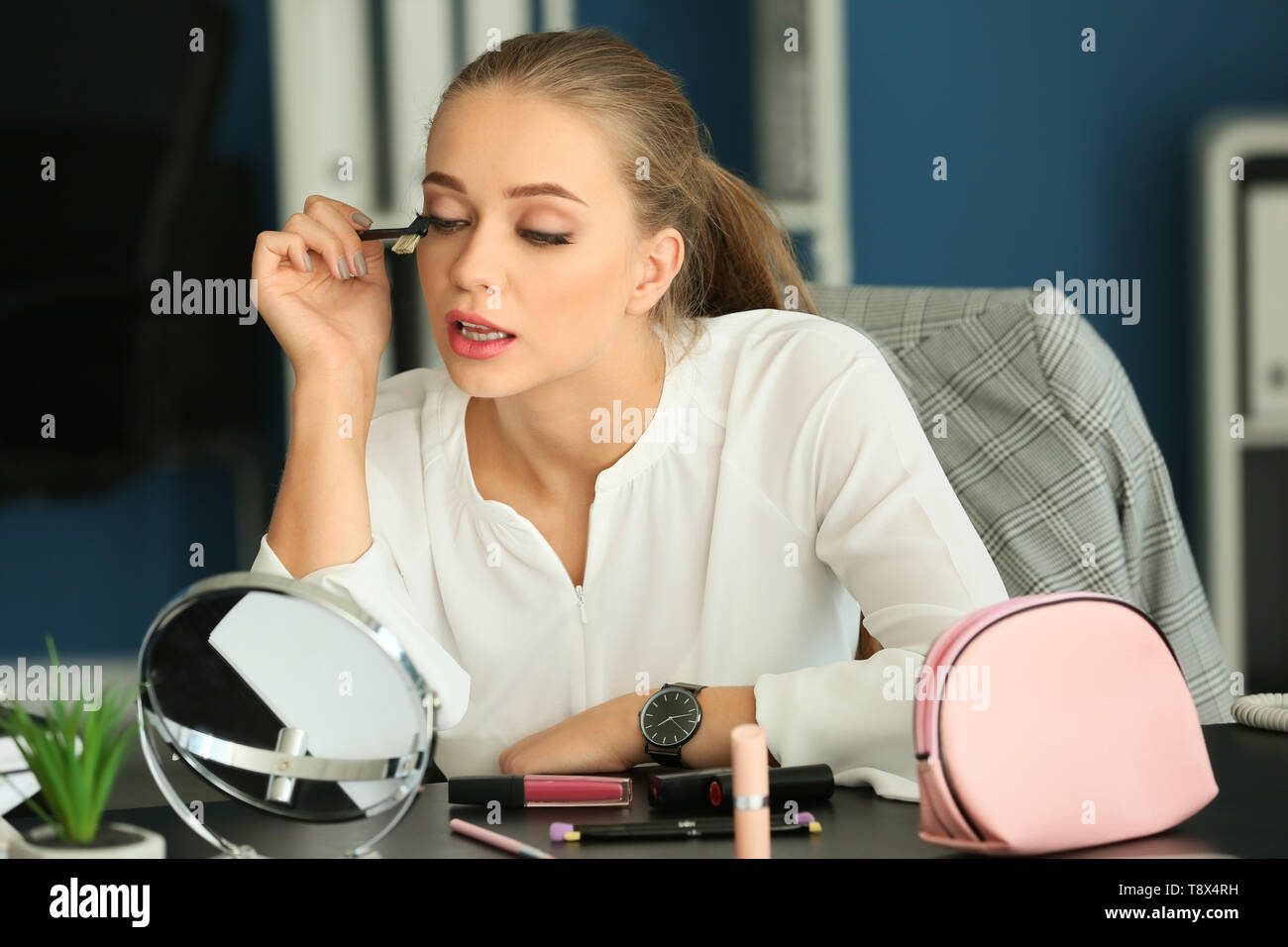 Assistant applying makeup hi-res stock photography and images - Alamy