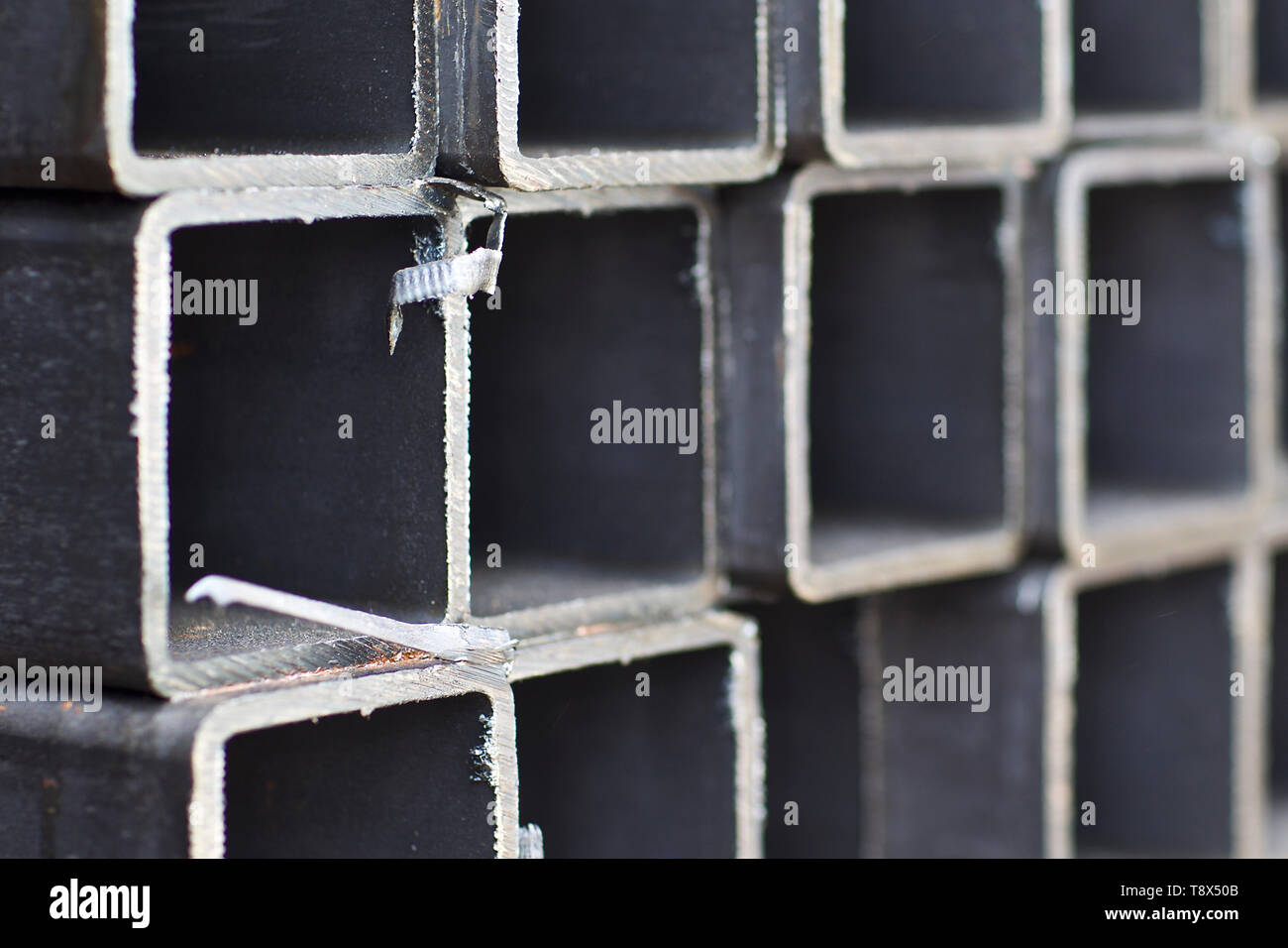 Metal profile pipe of rectangular cross section in packs at the ...